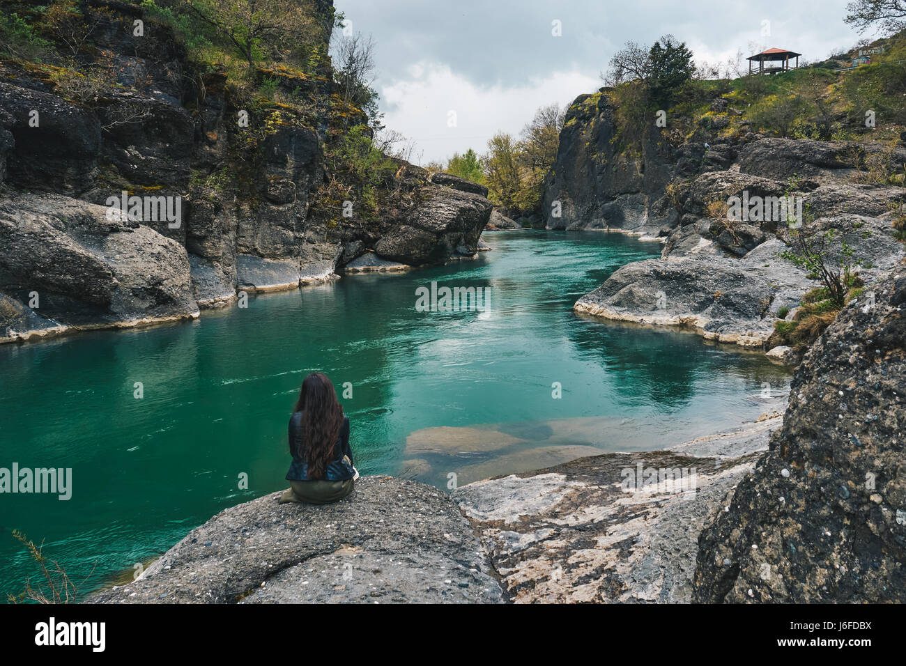 Girl enjoys the river view Stock Photo - Alamy