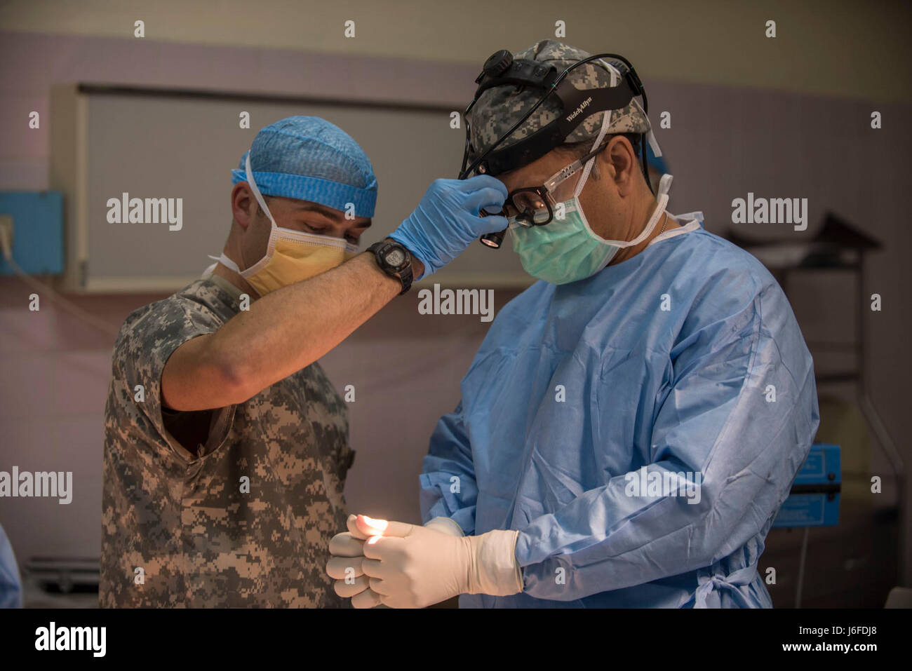 U.S. Army Reserve Sgt. Christopher Mason, a practicing nurse specialist ...