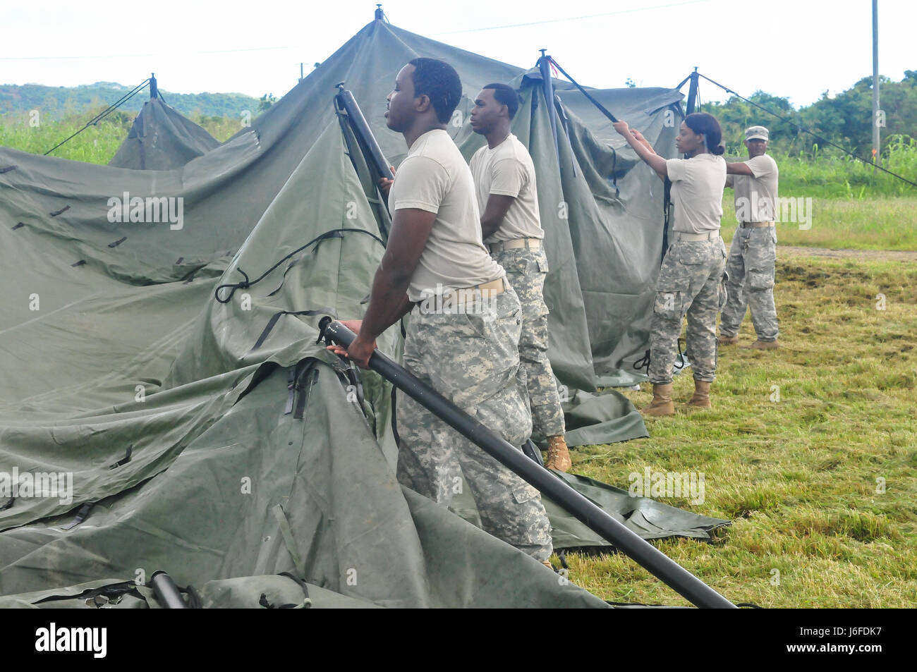 Soldiers from the 662nd Engineer Company, 104th Troop Command of the ...