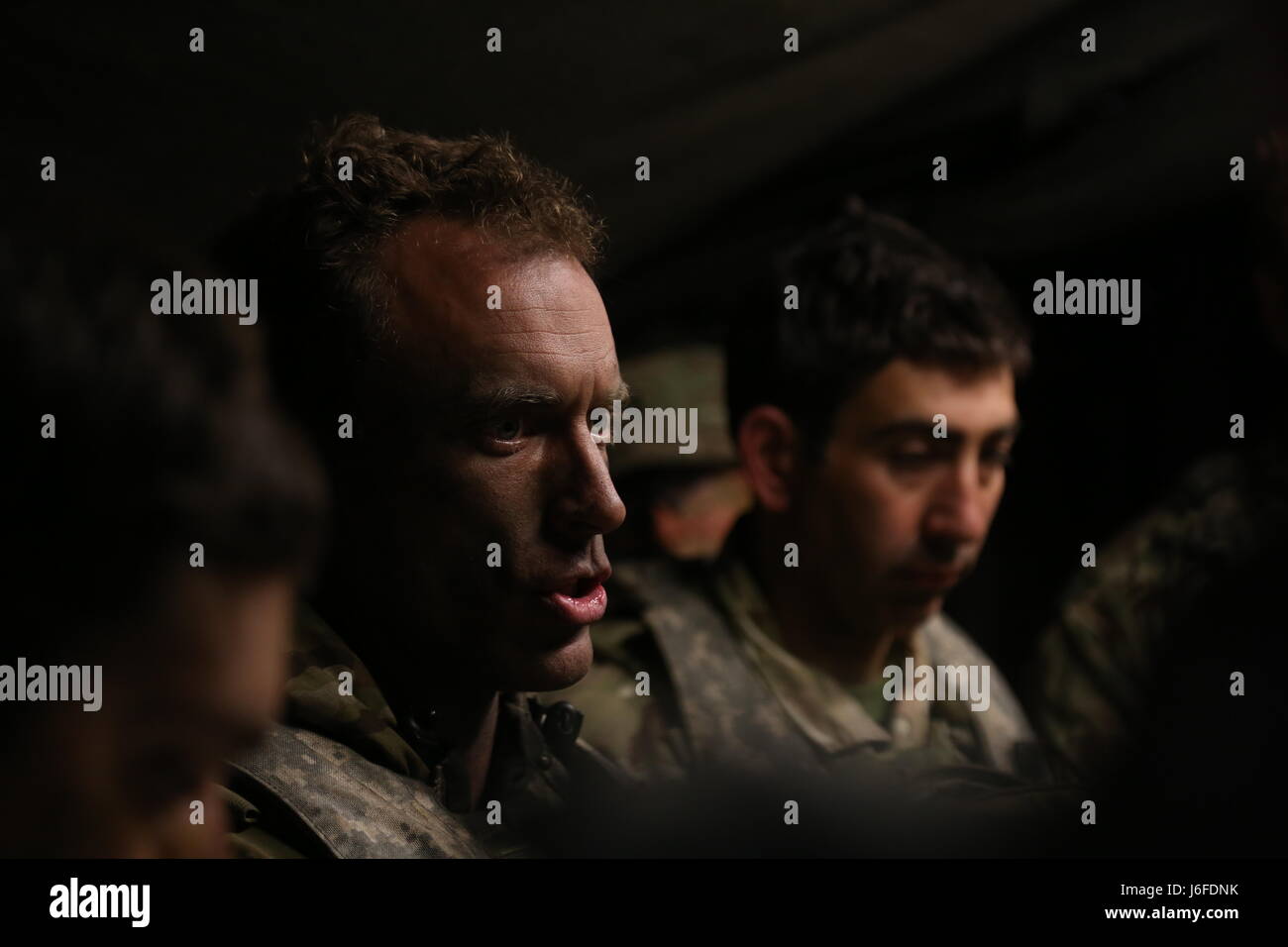 British Army Lt. Col. Nick Cowley of the Queens Royal Hussars briefs ...