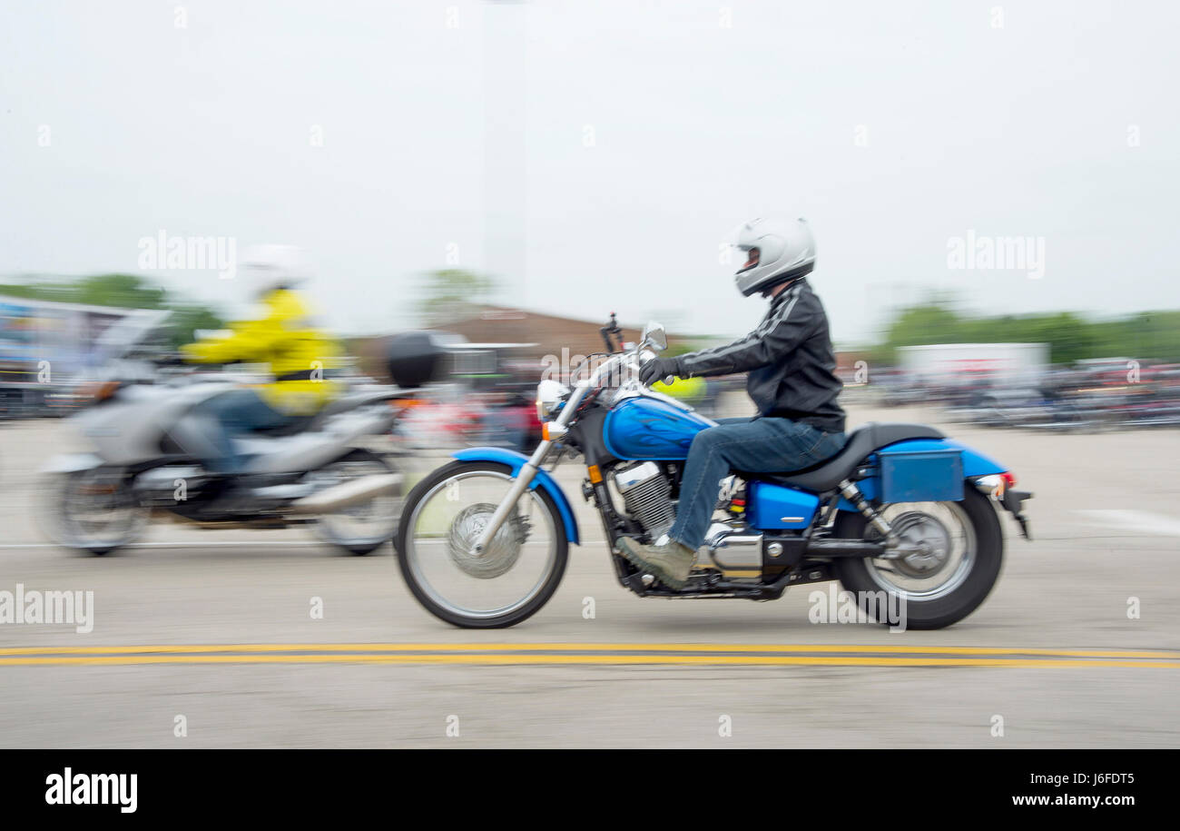 Motorcyclists take off at the start of the Motorcycle Safety Day ride ...