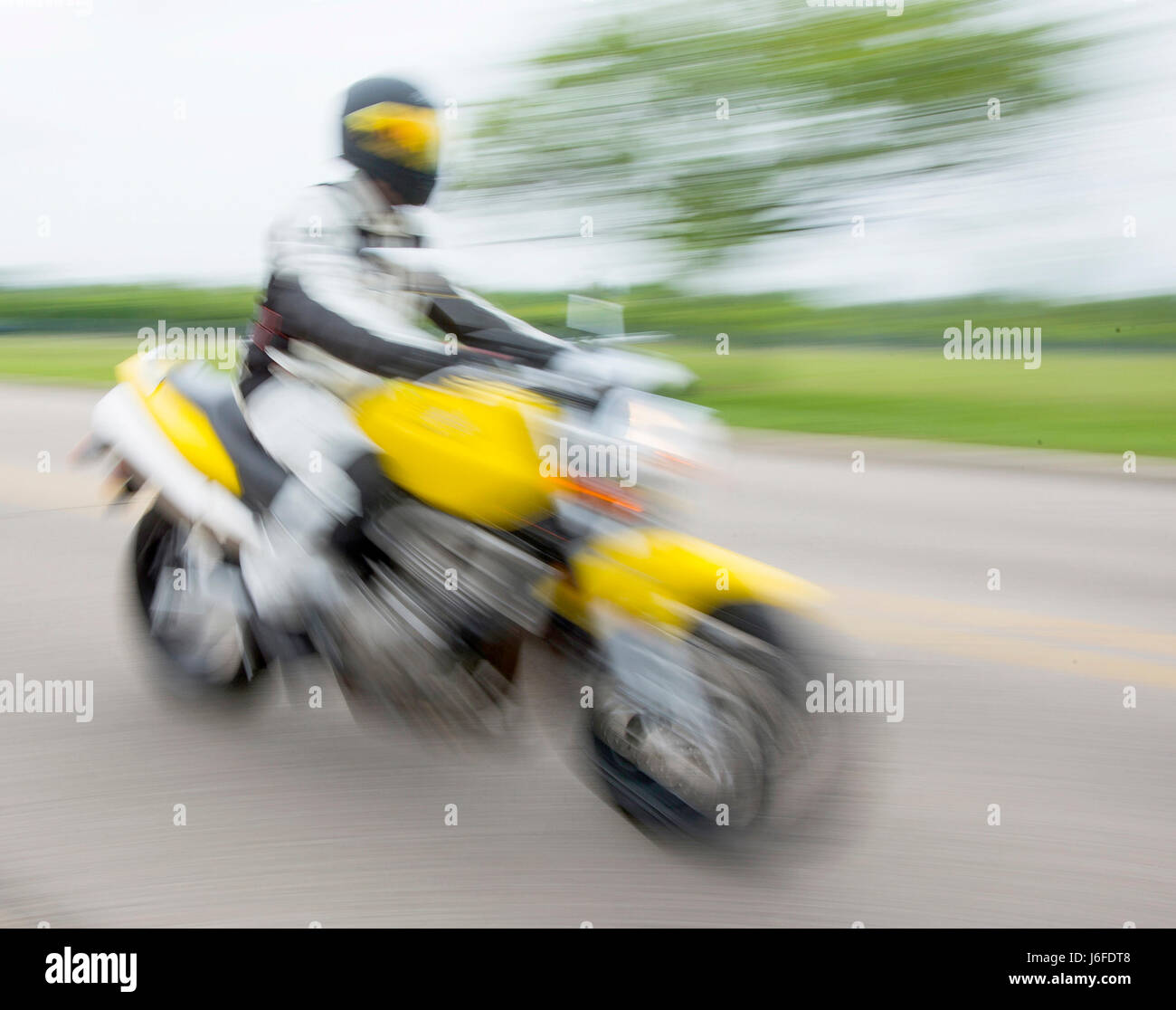 Motorcyclists take off at the start of the Motorcycle Safety Day ride ...