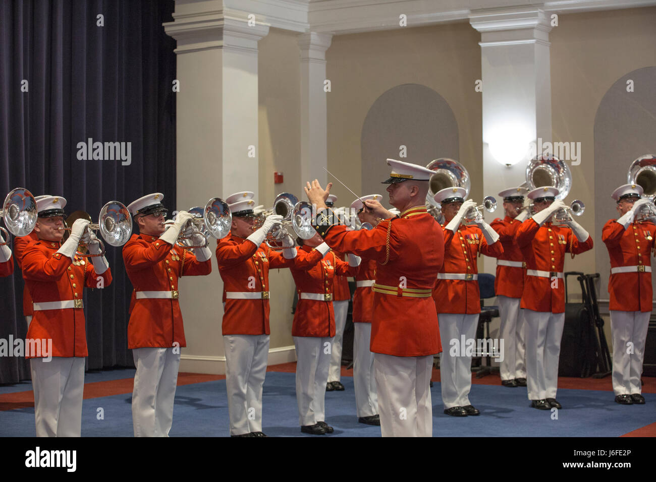 The U.S. Marine Drum and Bugle Corps performs during an evening parade ...