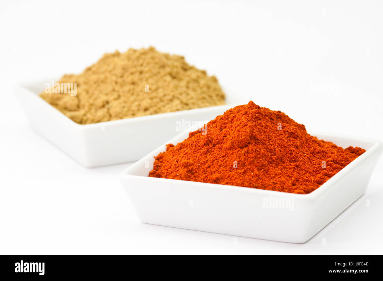 chili powder and coriander powder Stock Photo - Alamy