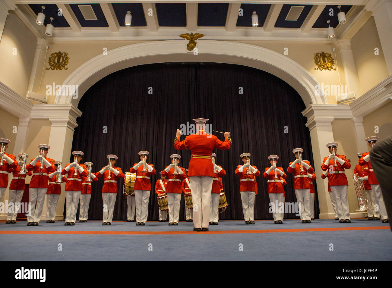 The U.S. Marine Drum and Bugle Corps performs during an evening parade ...