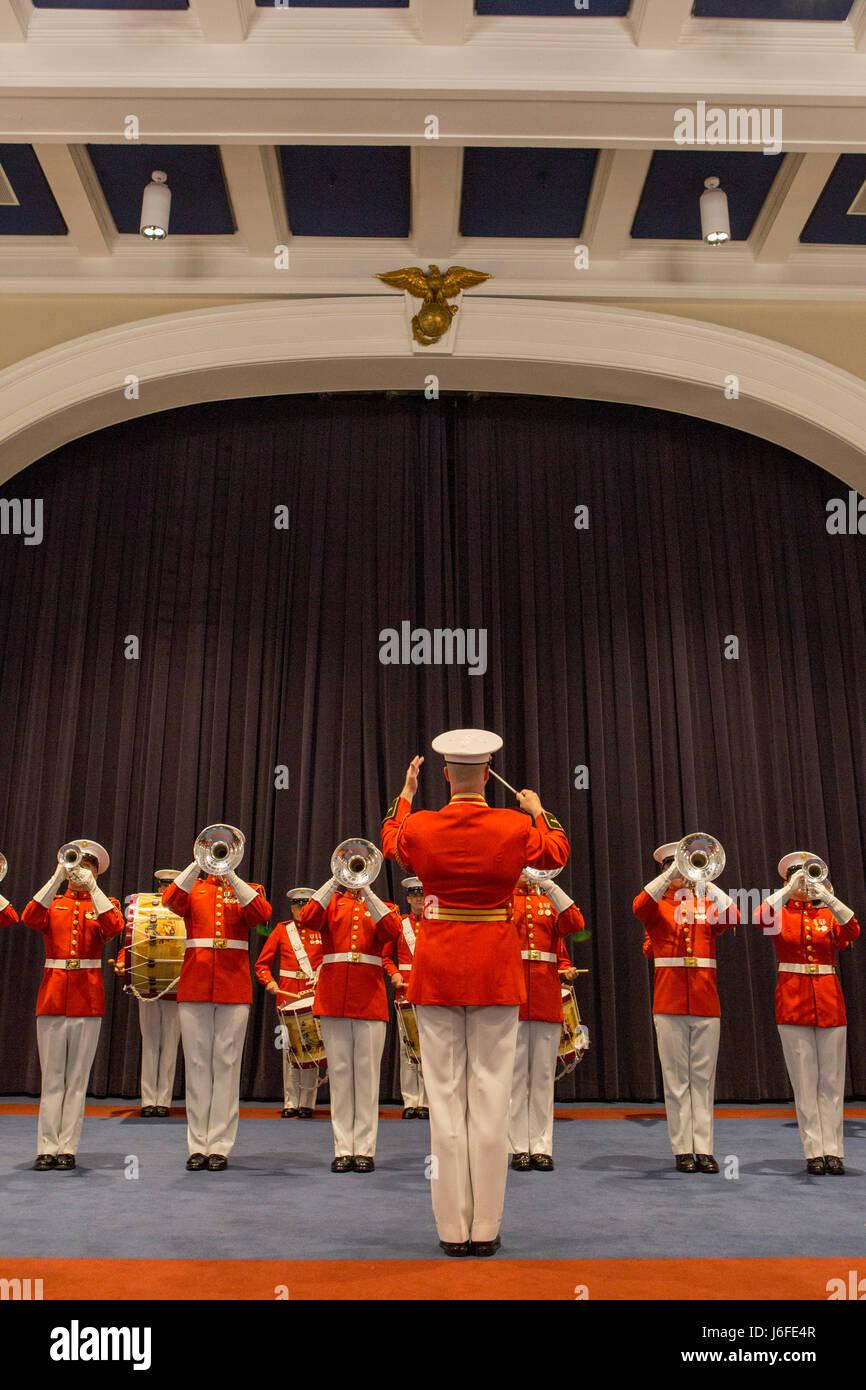The U.S. Marine Drum and Bugle Corps performs during an evening parade ...