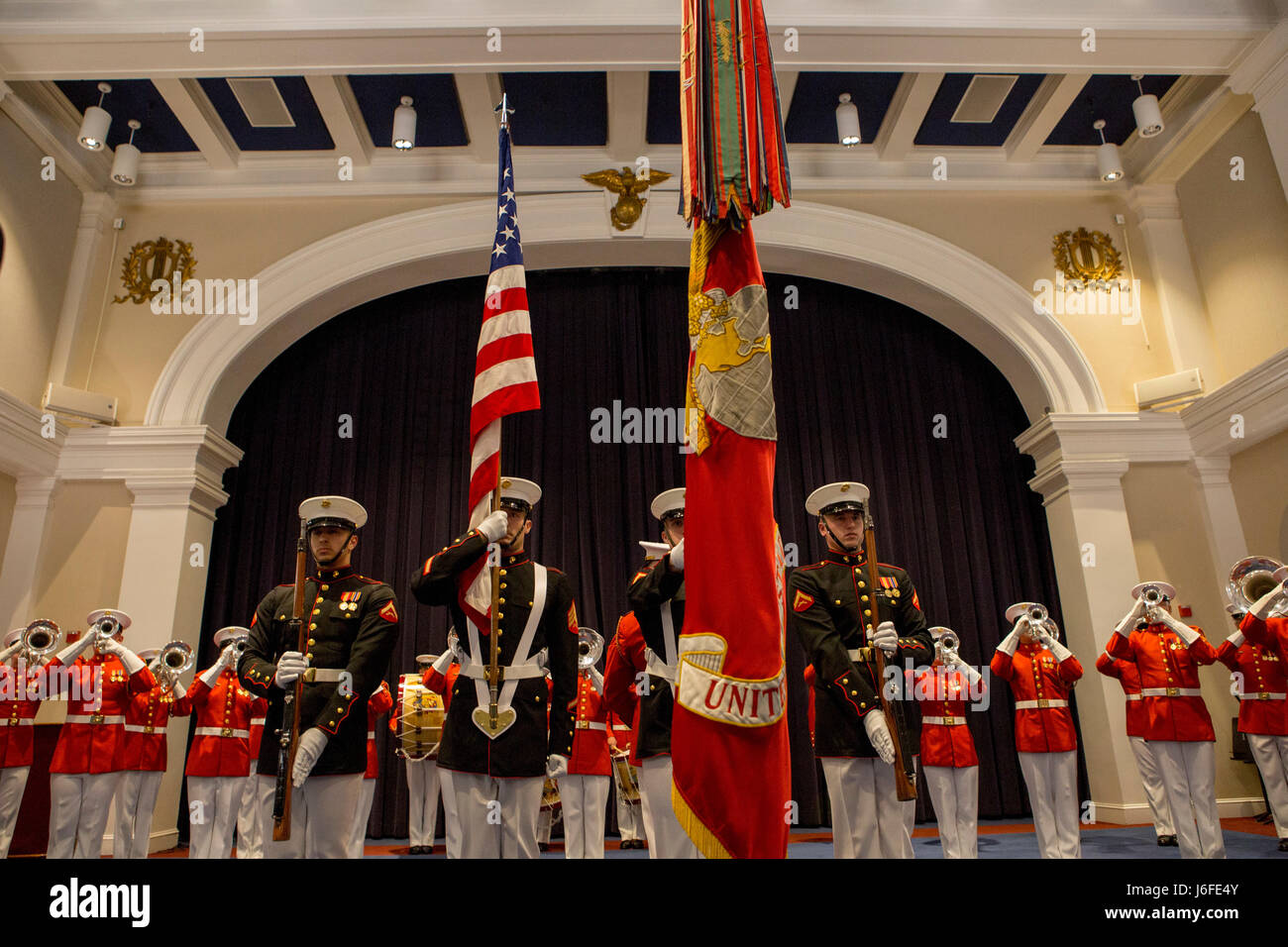 U.S. Marines with the official Marine Corps Color Guard present colors ...