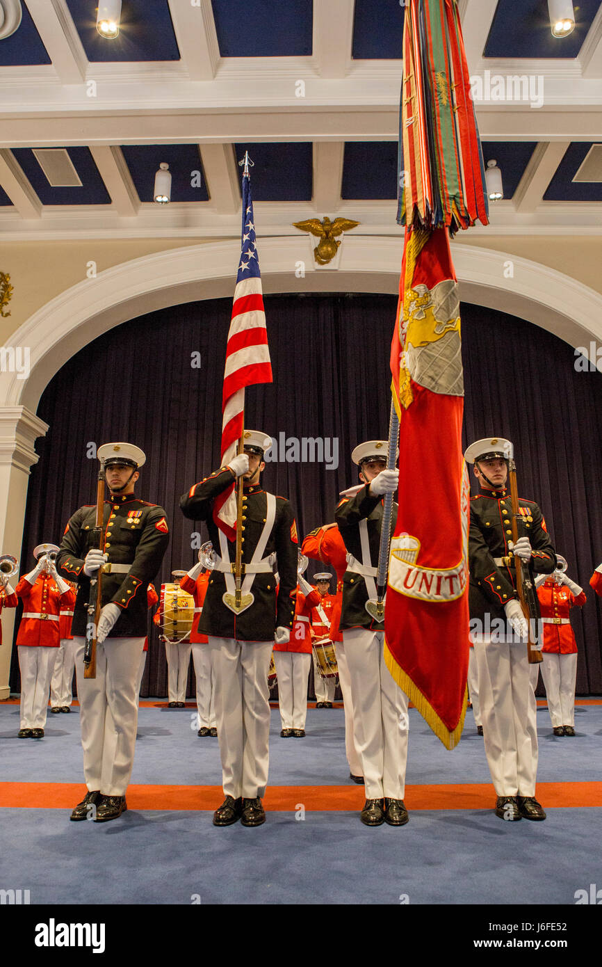 U.S. Marines with the official Marine Corps Color Guard present colors ...
