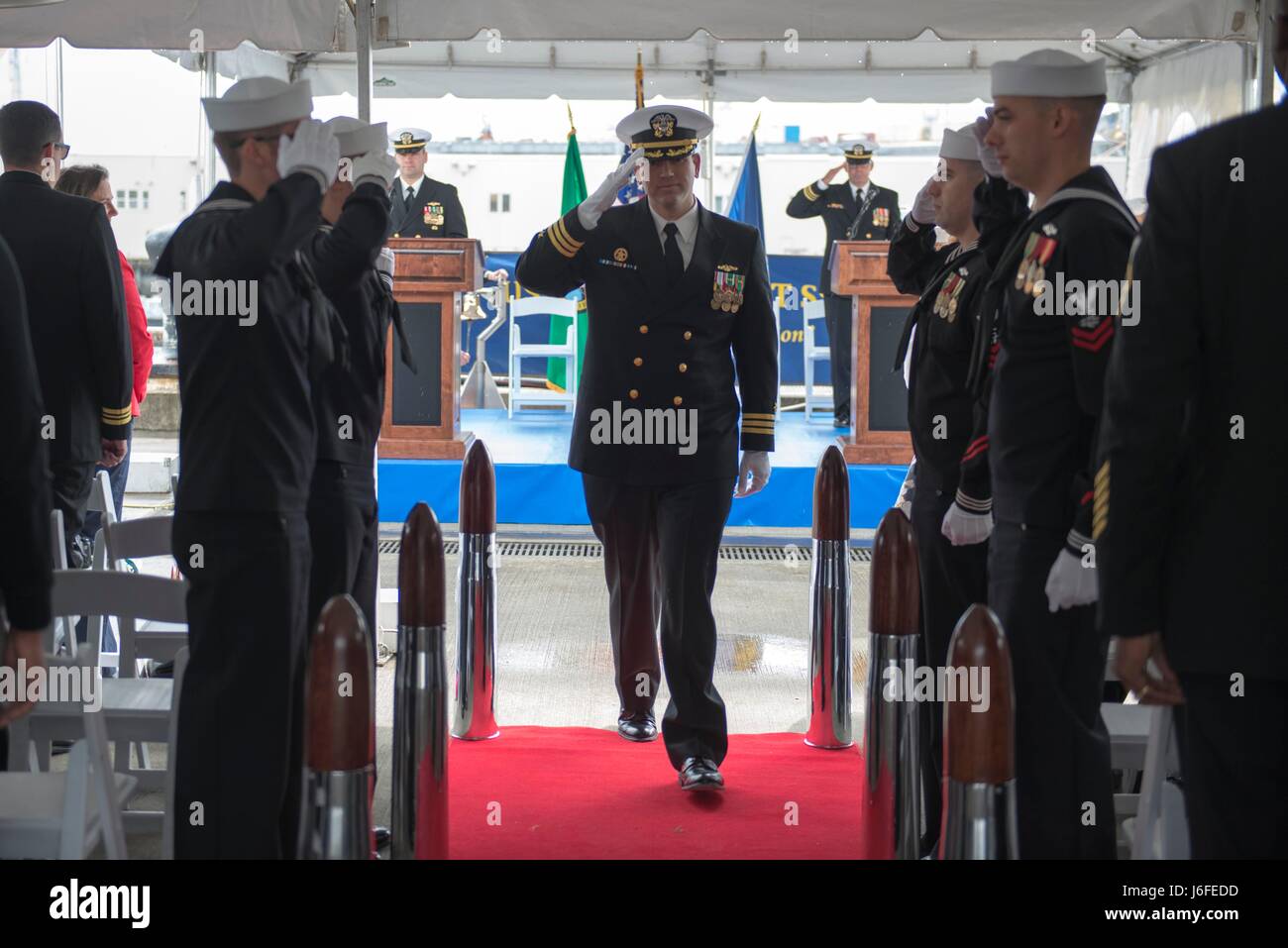 Cmdr. Carl Trask, from Glendora, California, is rung ashore for the ...