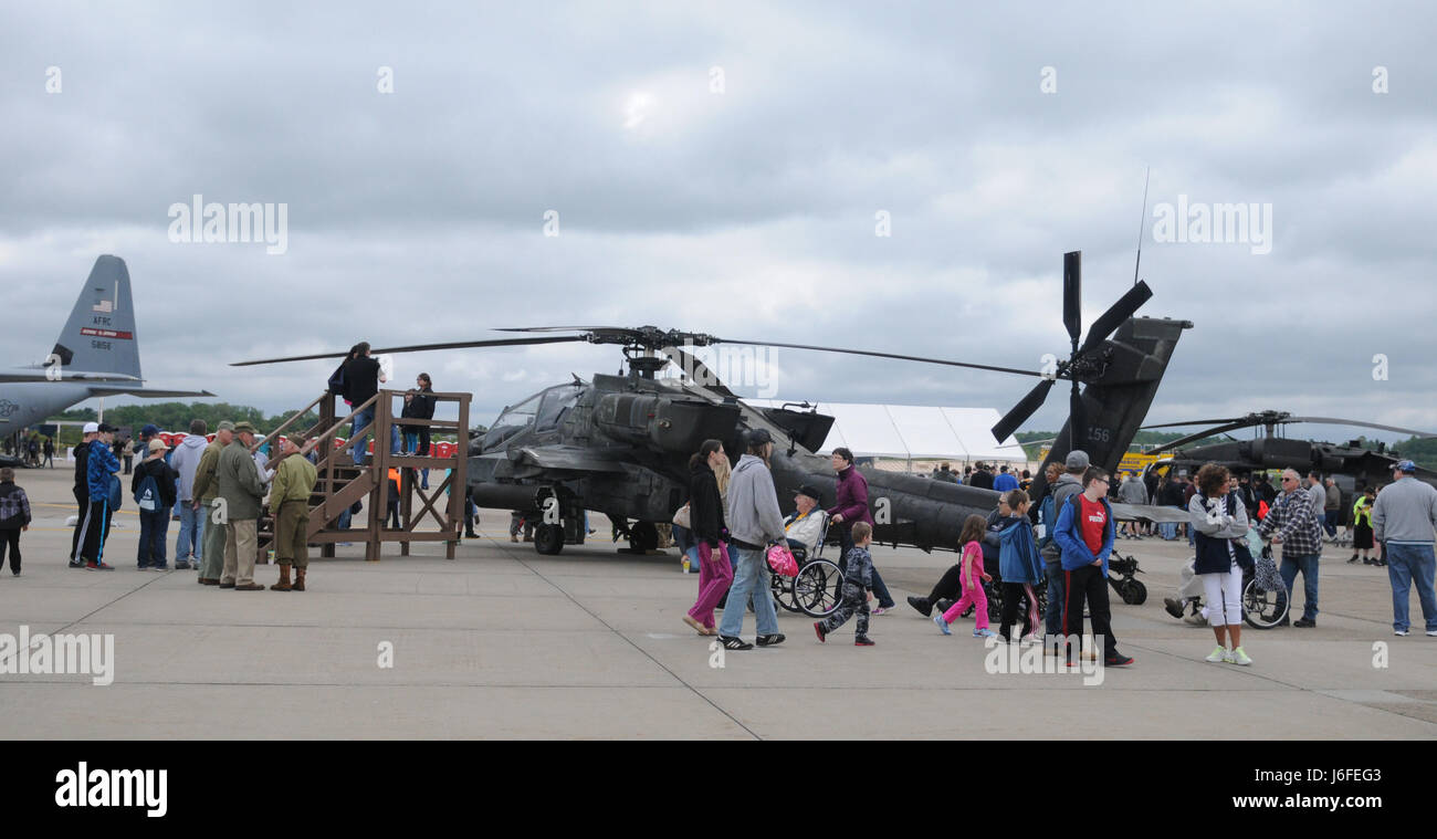 Spectators surround an apache helicopter belonging to the 2nd Infantry ...