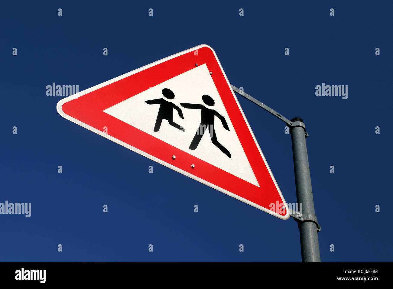 warning sign playing children Stock Photo - Alamy