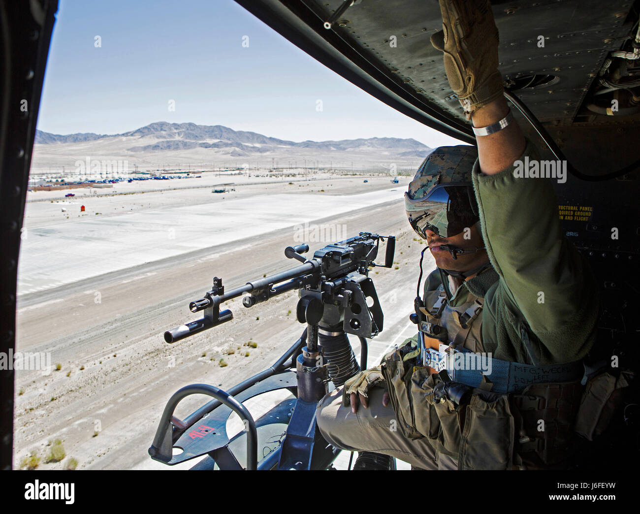 Marines conduct air assault training with UH-1Y Huey helicopters during ...