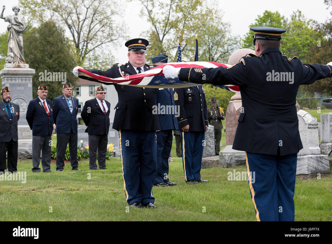 U.S. Soldiers with the Vermont National Guard Military Funeral Honors team, participate in the ...