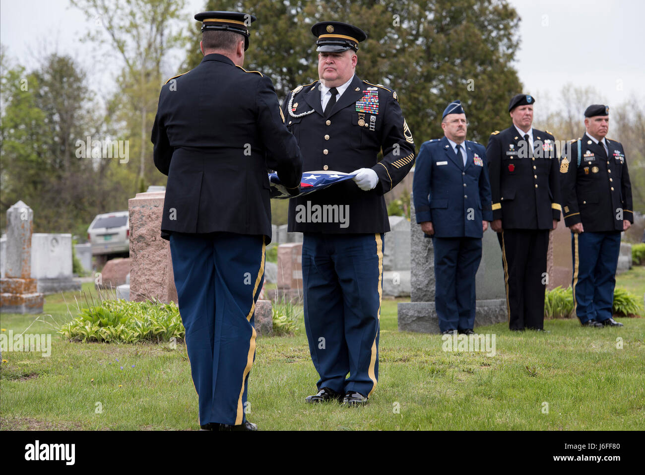 U.S. Soldiers with the Vermont National Guard Military Funeral Honors team, participate in the ...