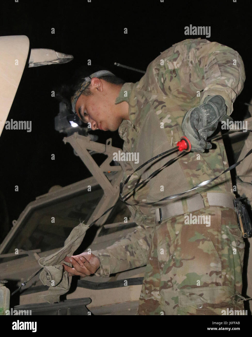 A combat engineer from the 37th Brigade Engineer Battalion, 2nd Brigade ...