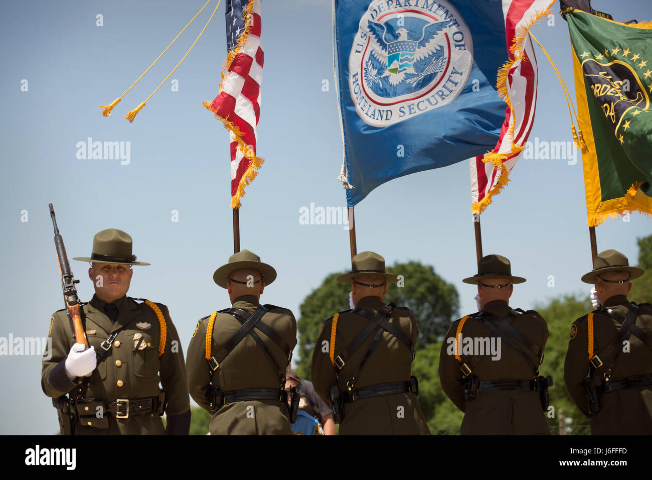 Members of the U.S. Border Patrol Honor Guard perform during the Stock ...