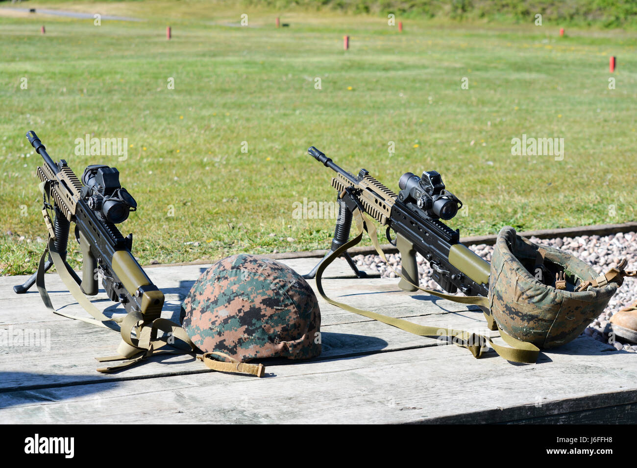 Kevlars and SA80 A2 L85 Assualt Rifles are set out for a rifle course ...