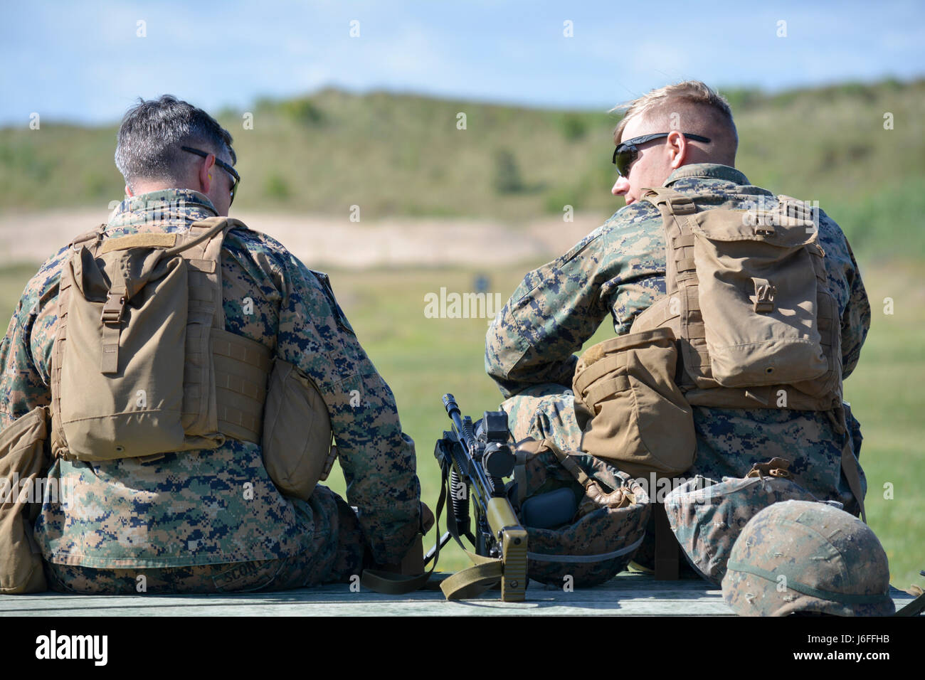 U.S. Marine Corps Sgt. James Sconyers, primary marksmanship instructor ...
