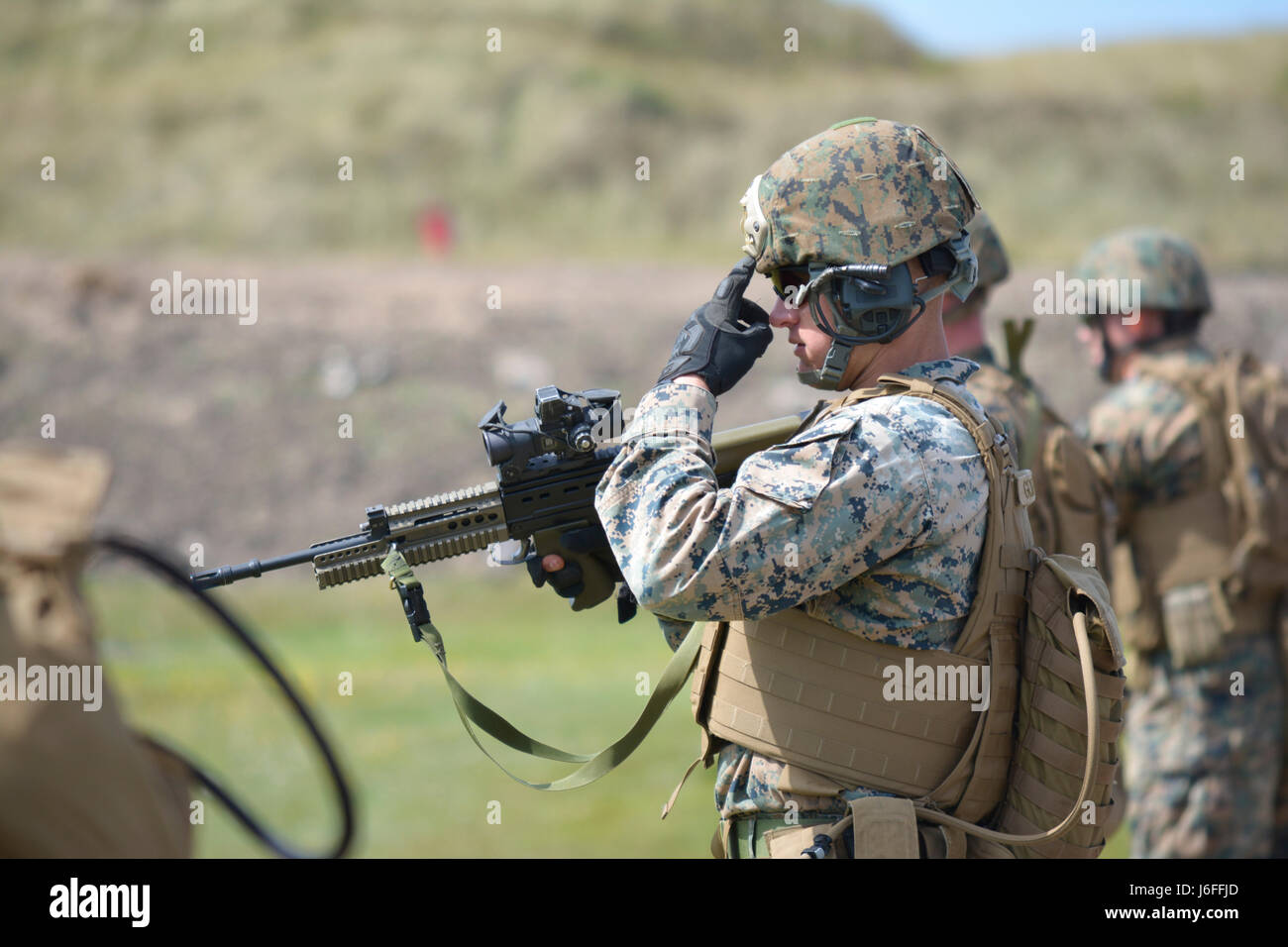 U.S. Marine Corps Sgt. Joshua Godrey, foreign weapons instructor ...