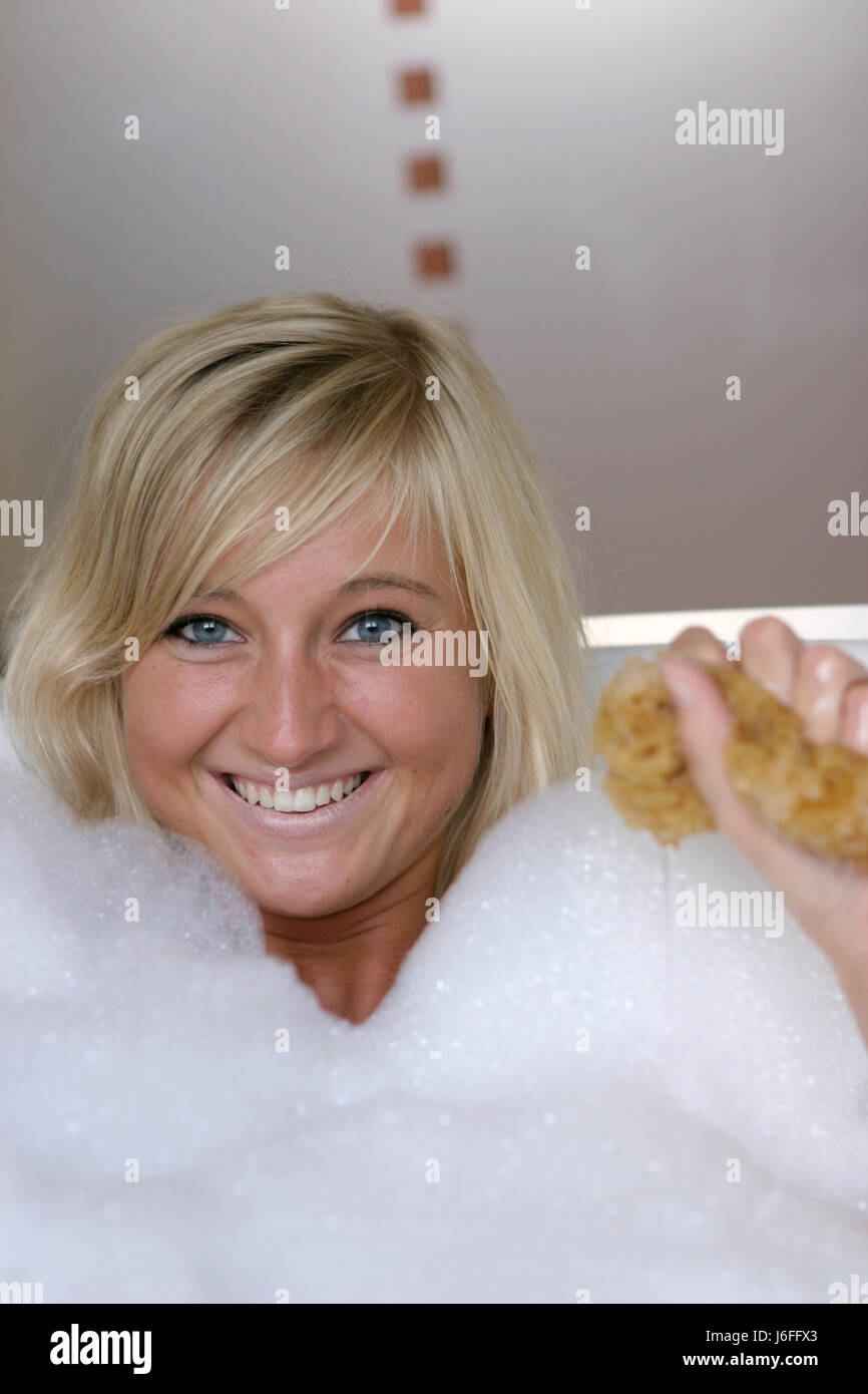 Young blonde woman in bathtub hi-res stock photography and images - Alamy