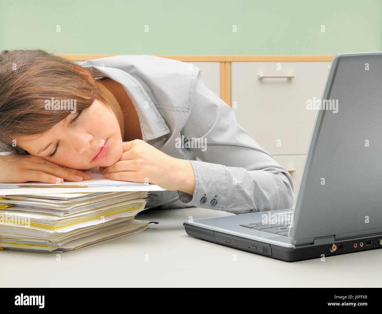 woman office tired listless overworked overwrought unmotivated ...