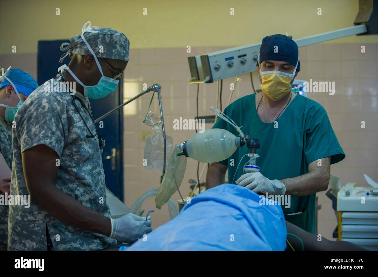 U.S. Army Reserve Maj. Christopher Sims, a nurse anesthetist, and his ...