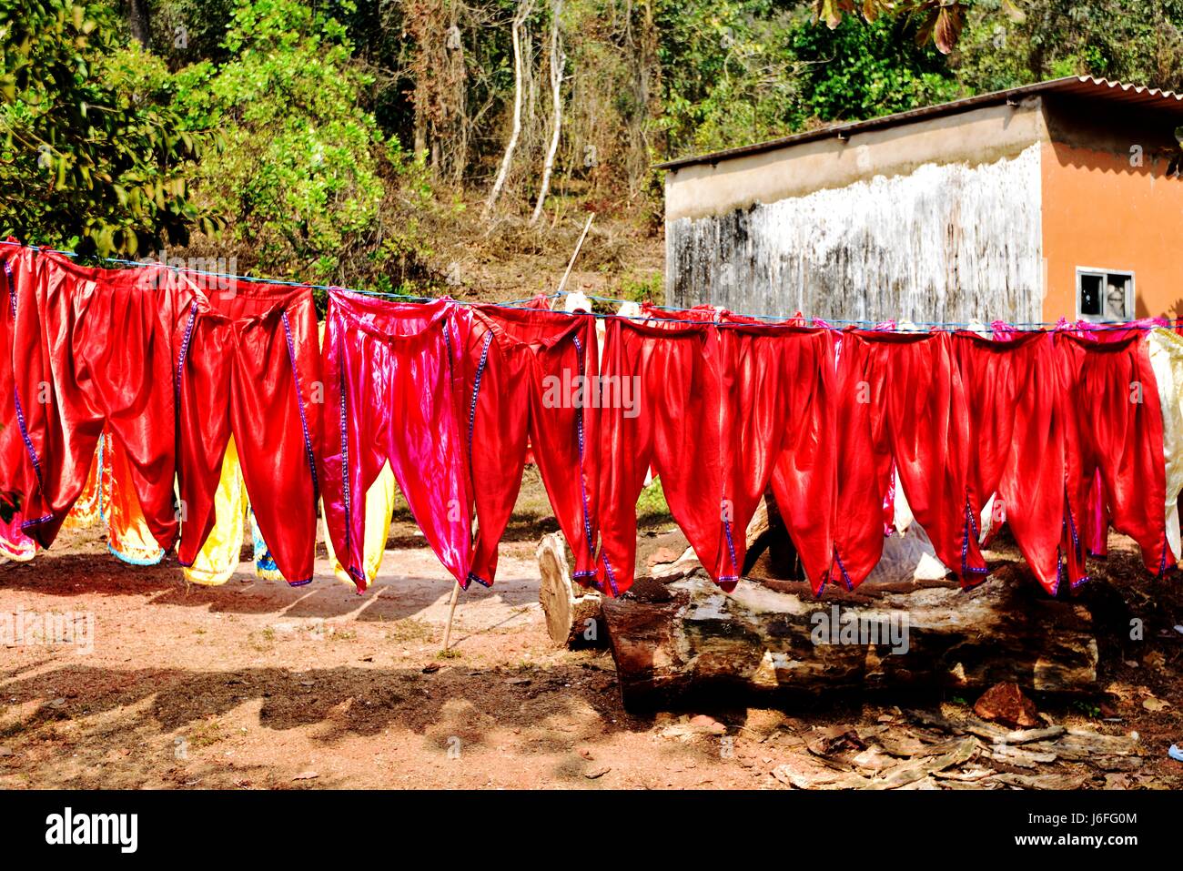 Red trousers on a washing line Stock Photo - Alamy