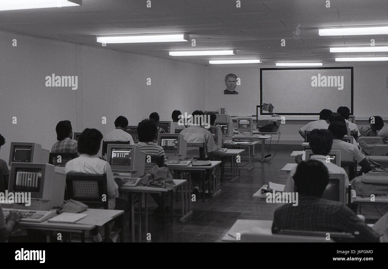 men sitting at computers Stock Photo - Alamy