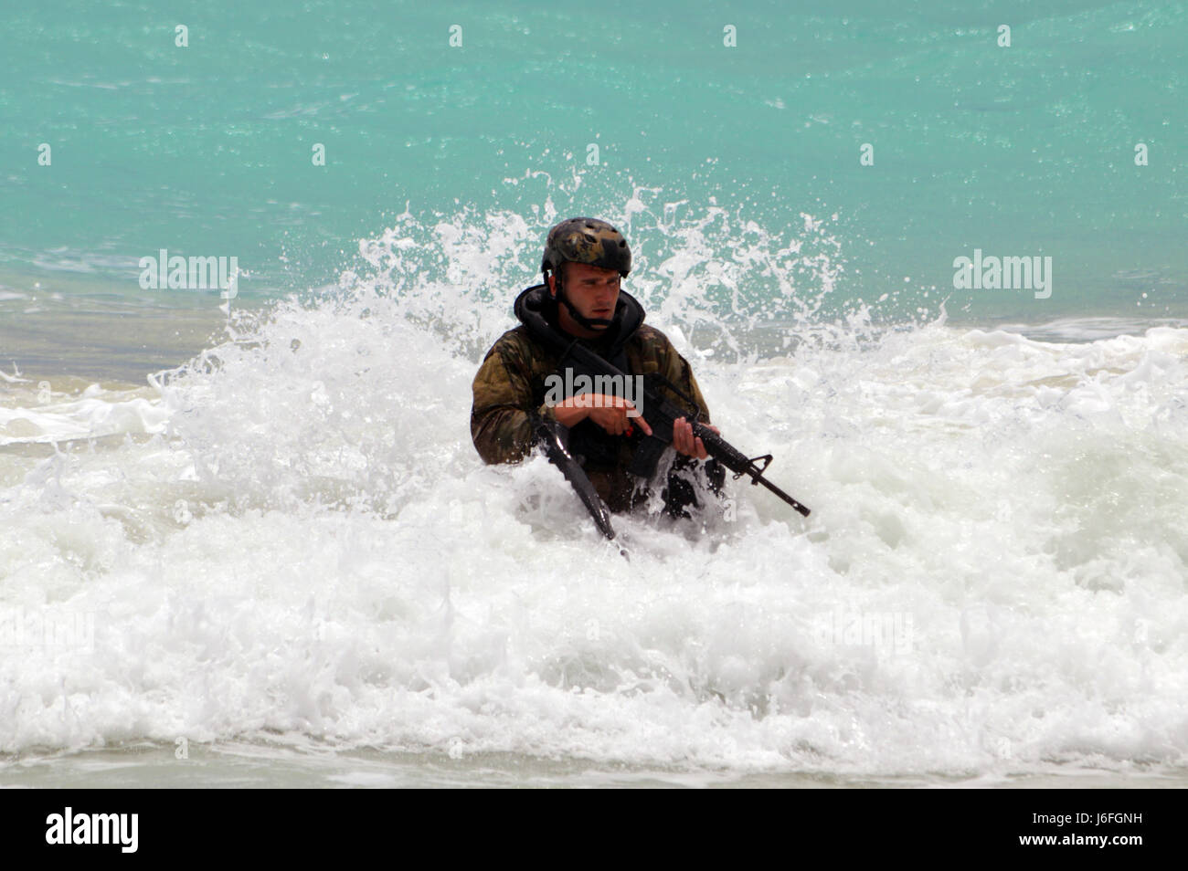 An infantryman from 3rd Squadron, 4th Cavalry Regiment, 25th Infantry ...