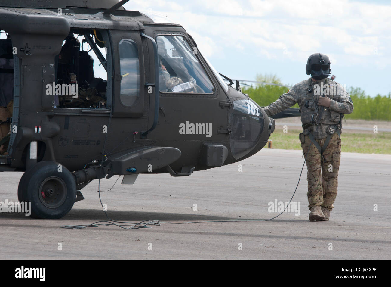 Sgt. Christopher Raynor, a crew chief with the 1-169th Aviation ...