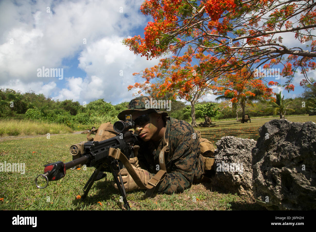 A U.S. Marine holds security during a patrolling exercise on the Island ...