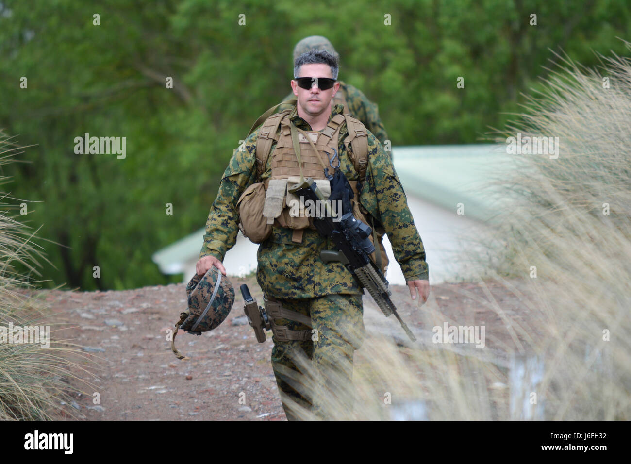 U.S. Marine Corps Sgt. James Sconyers, primary marksmanship instructor ...