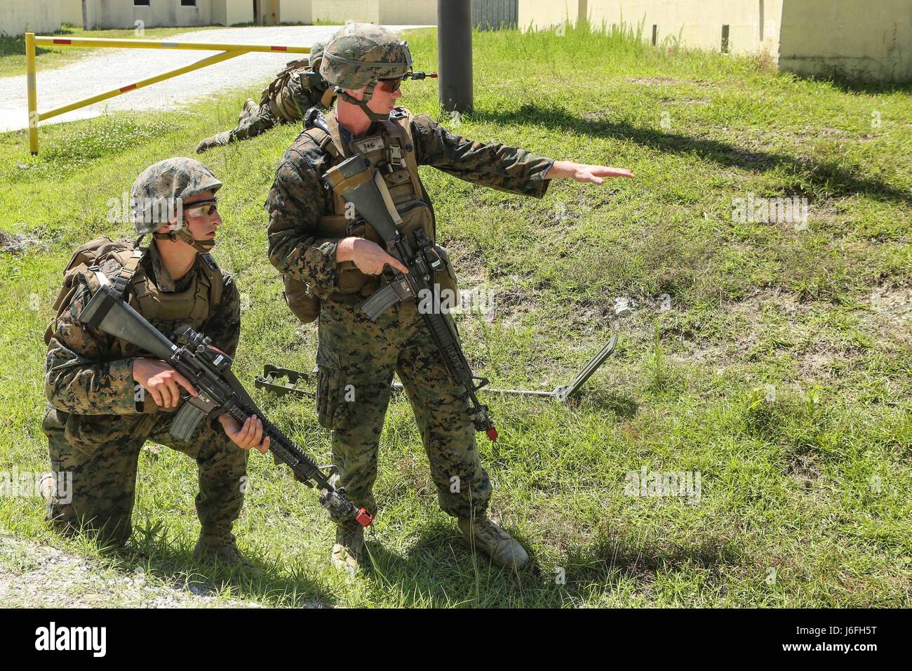 U.S. Marine Corps Lance Cpl. Todd Wedman Jr., left, Combat Engineer ...