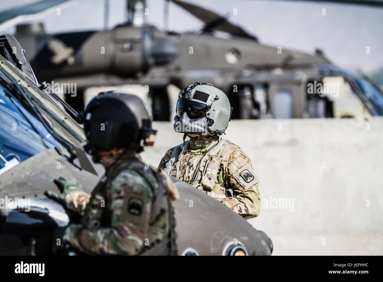 U.S. Army UH-60 Black Hawk helicopter crew chiefs assigned to Task ...