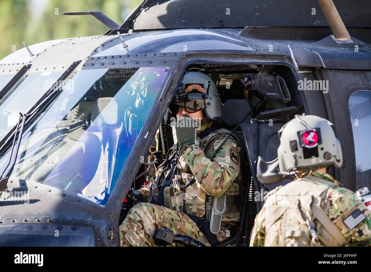 A UH-60 Black Hawk helicopter crew from Task Force Tigershark prepares ...