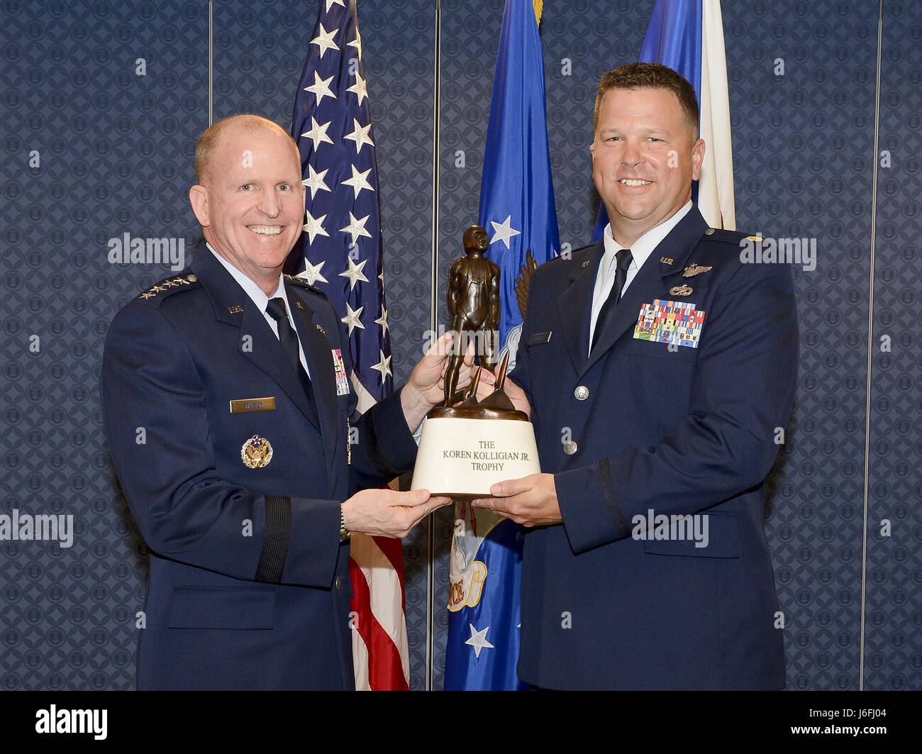 Air Force Vice Chief of Staff Gen. Stephen Wilson presents the Koren ...