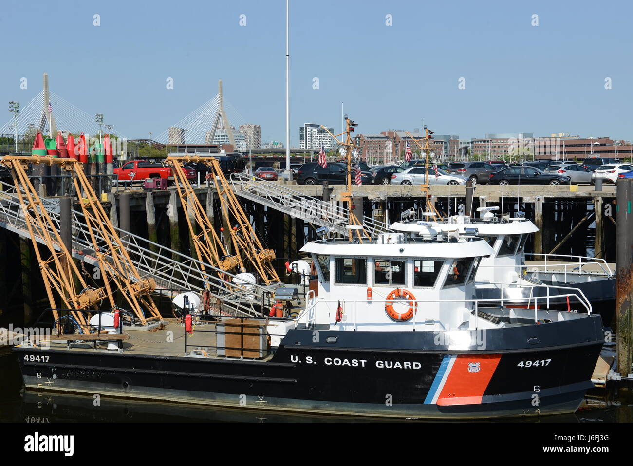 Two 49-foot Buoy Utility Stern Loading Boats moored at Coast Guard Base ...