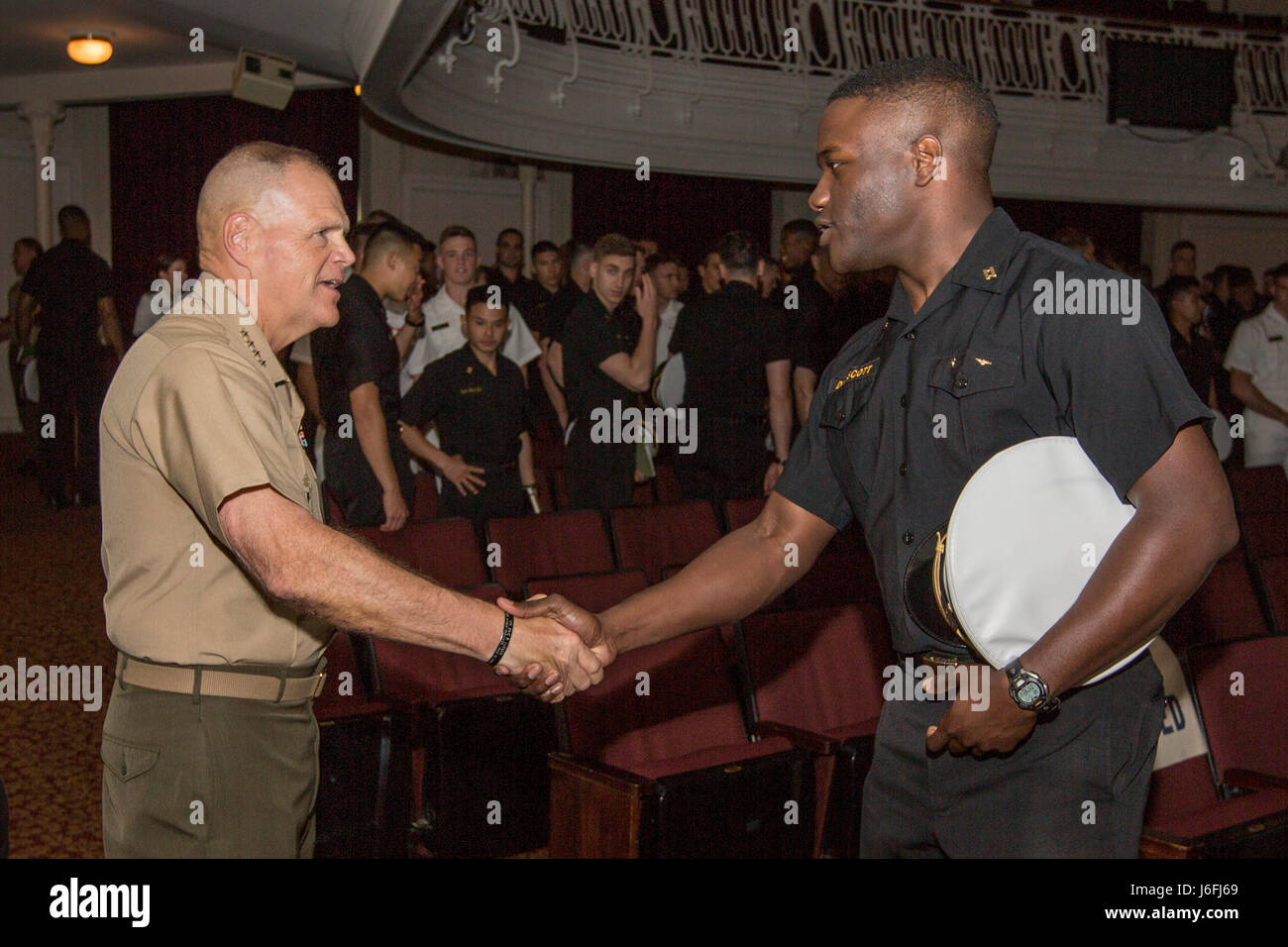 Commandant of the Marine Corps Gen. Robert B. Neller shakes hands with ...