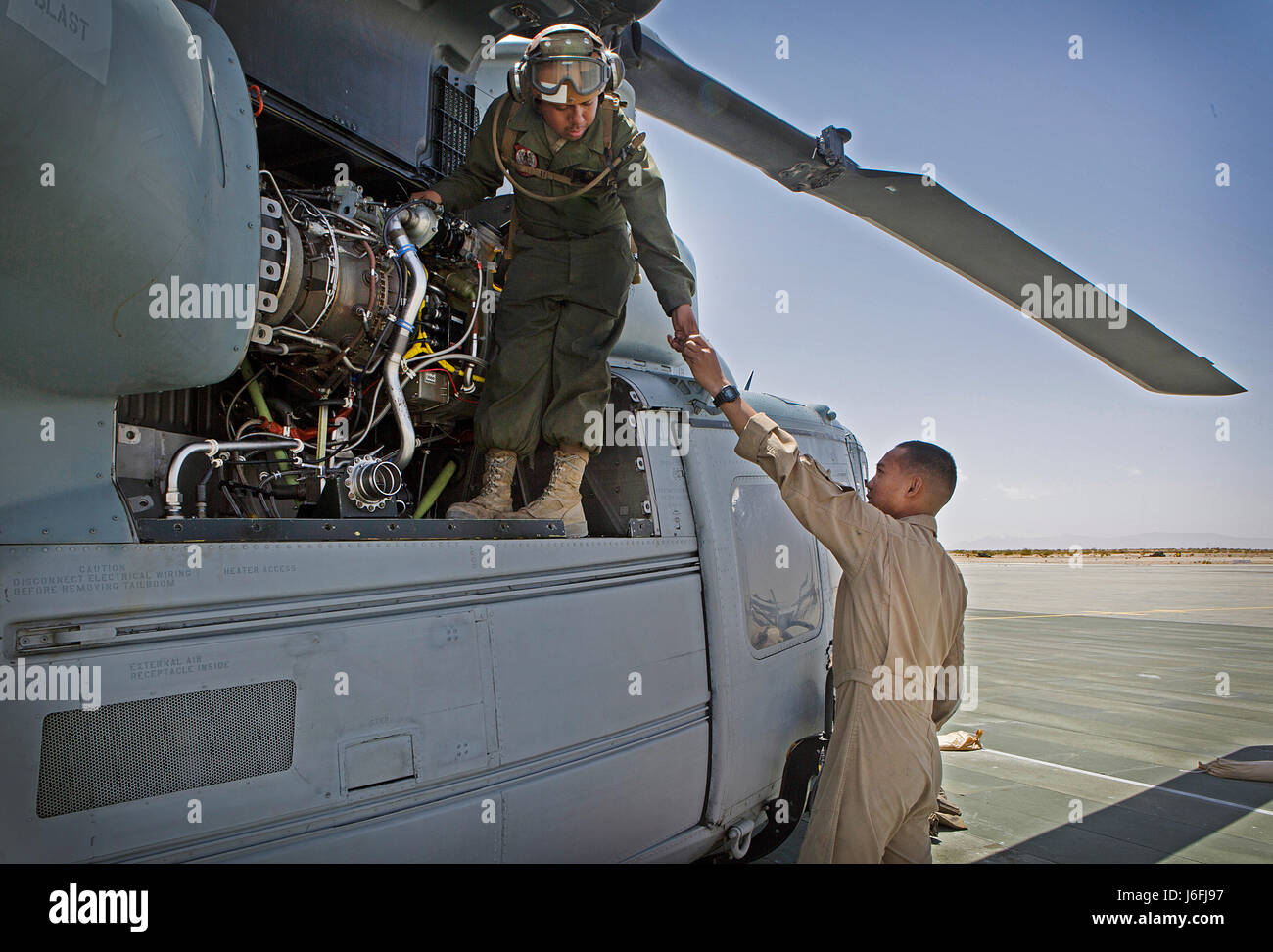 Marines with Marine Light Attack Helicopter Squadron (HMLA) 469 conduct ...