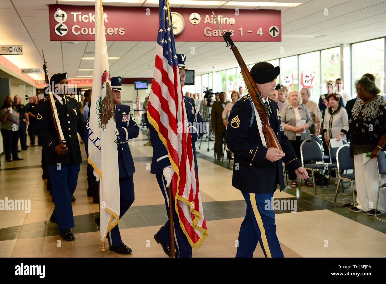 A joint color guard comprised of members of the Illinois Army and Air ...