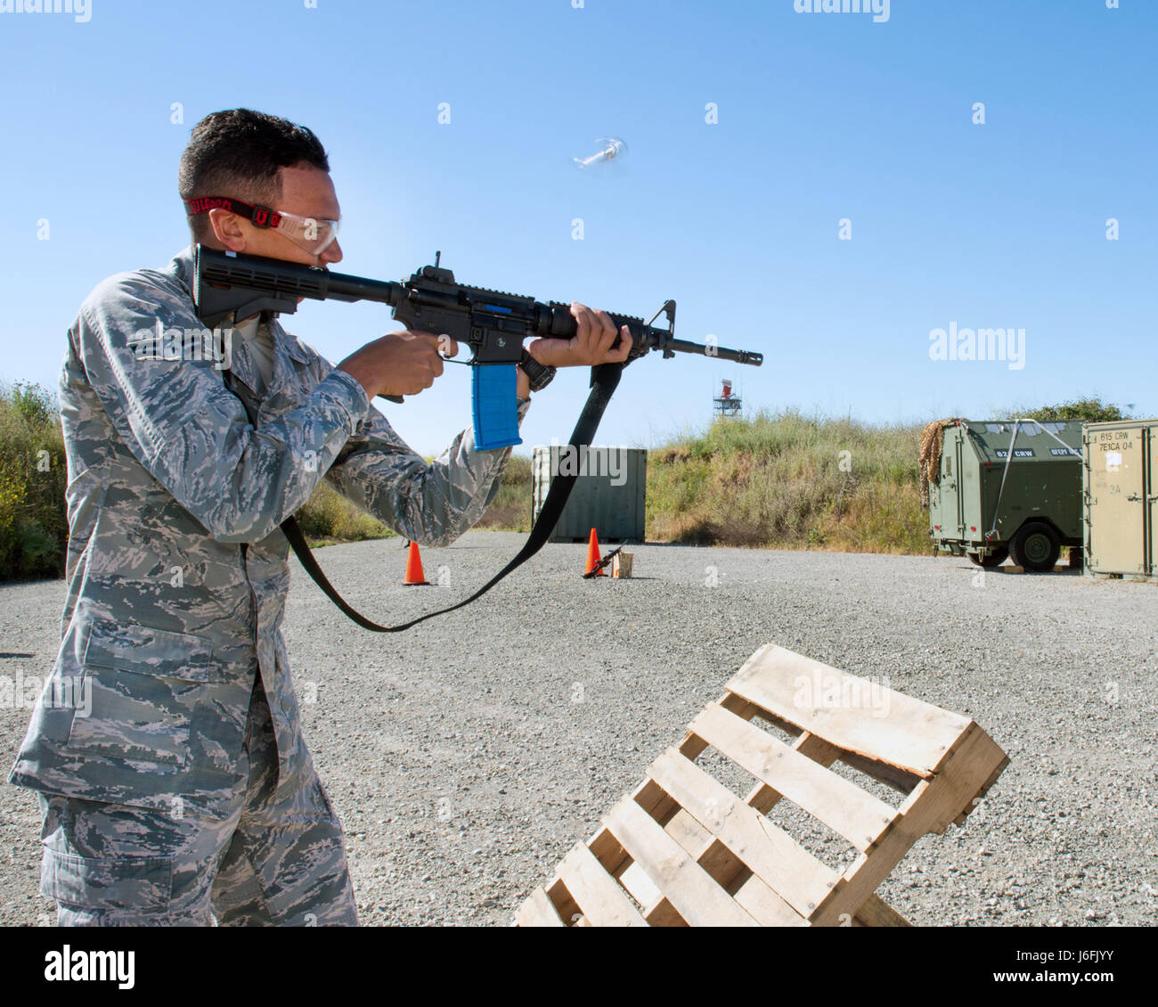 A Security Forces Squadron airman competes in a shooting event at ...