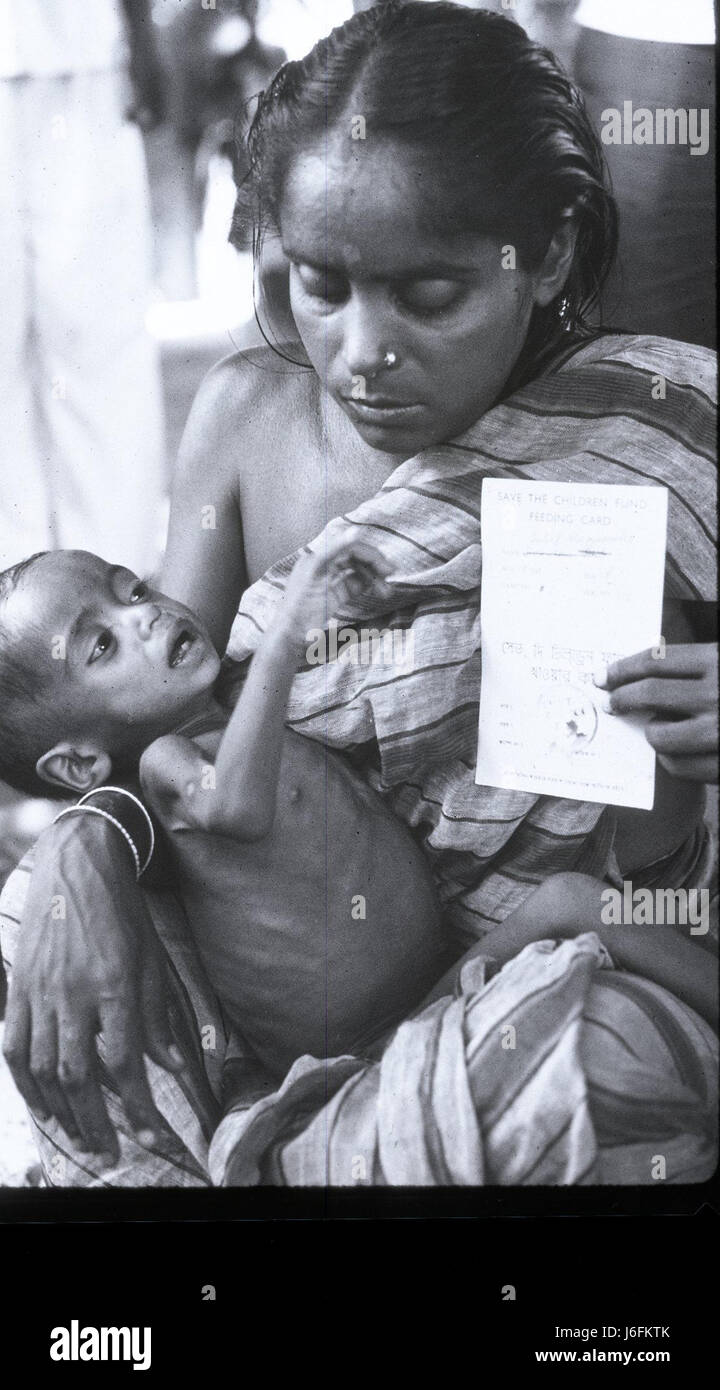 A WOMEN AND HER BABY IS CRYING Stock Photo - Alamy