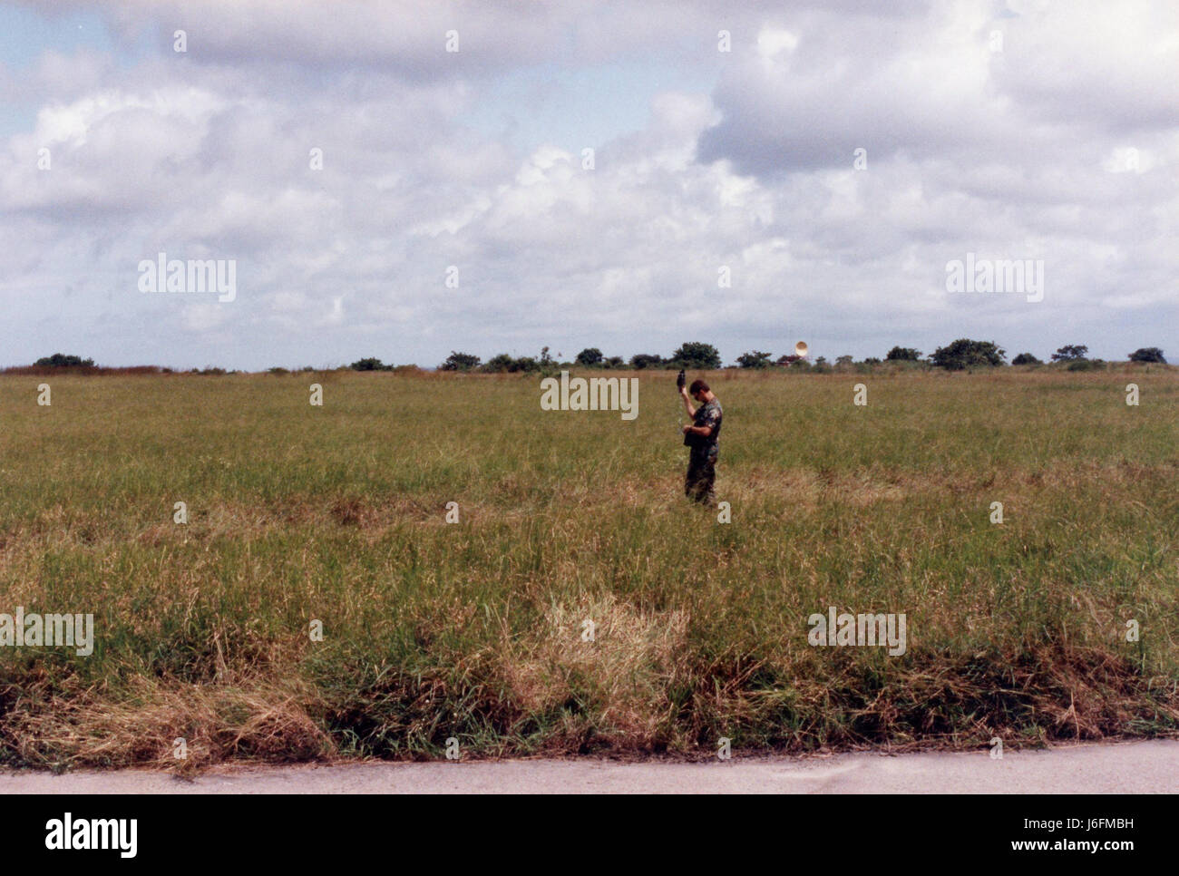 MAN IN FIELD Stock Photo - Alamy