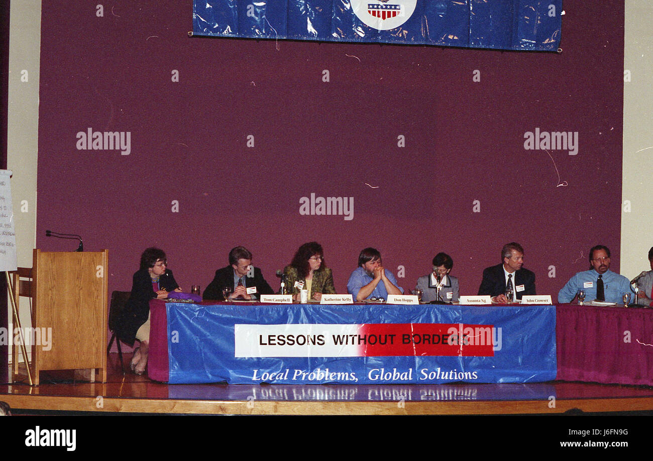 A GROUP OF MEN AND WOMEN ON STAGE AT THE LESSONS WITHOUT BORDERS Stock ...