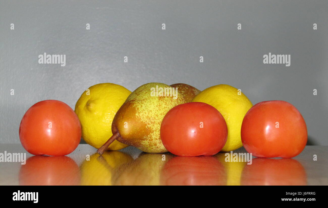 fruit pear bulb tomato lemon citron red yellow selection table ...