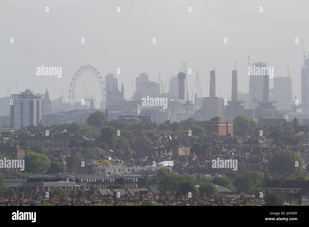 London, UK. 21st May, 2017. London skyline seen from Wimbledon bathed ...