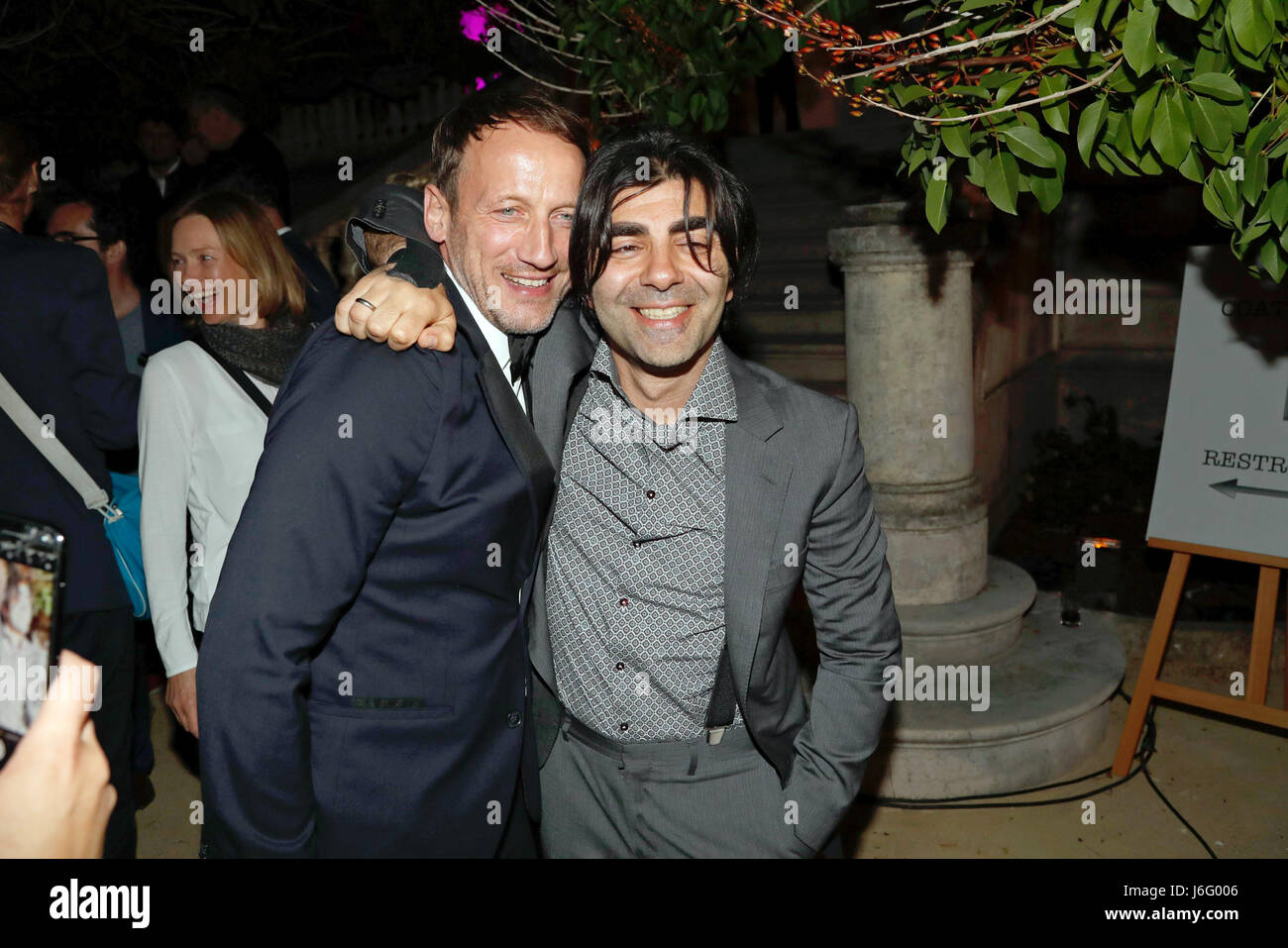 Cannes, France. 20th May, 2017. German actor Wotan Wilke Moehring (L ...