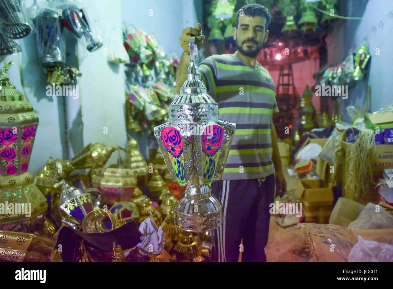 Cairo, Egypt. 21st May, 2017. An Egyptian worker manufactures a ...