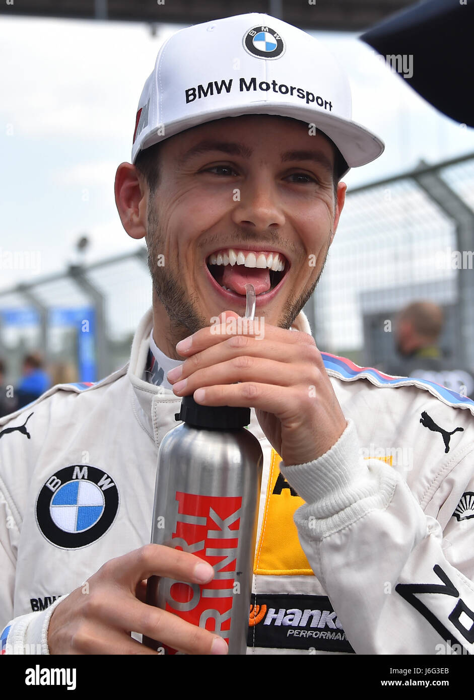 Klettwitz, Germany. 21st May, 2017. BMW pilot Tom Blomqvist from Great Britain drinks out of a ...