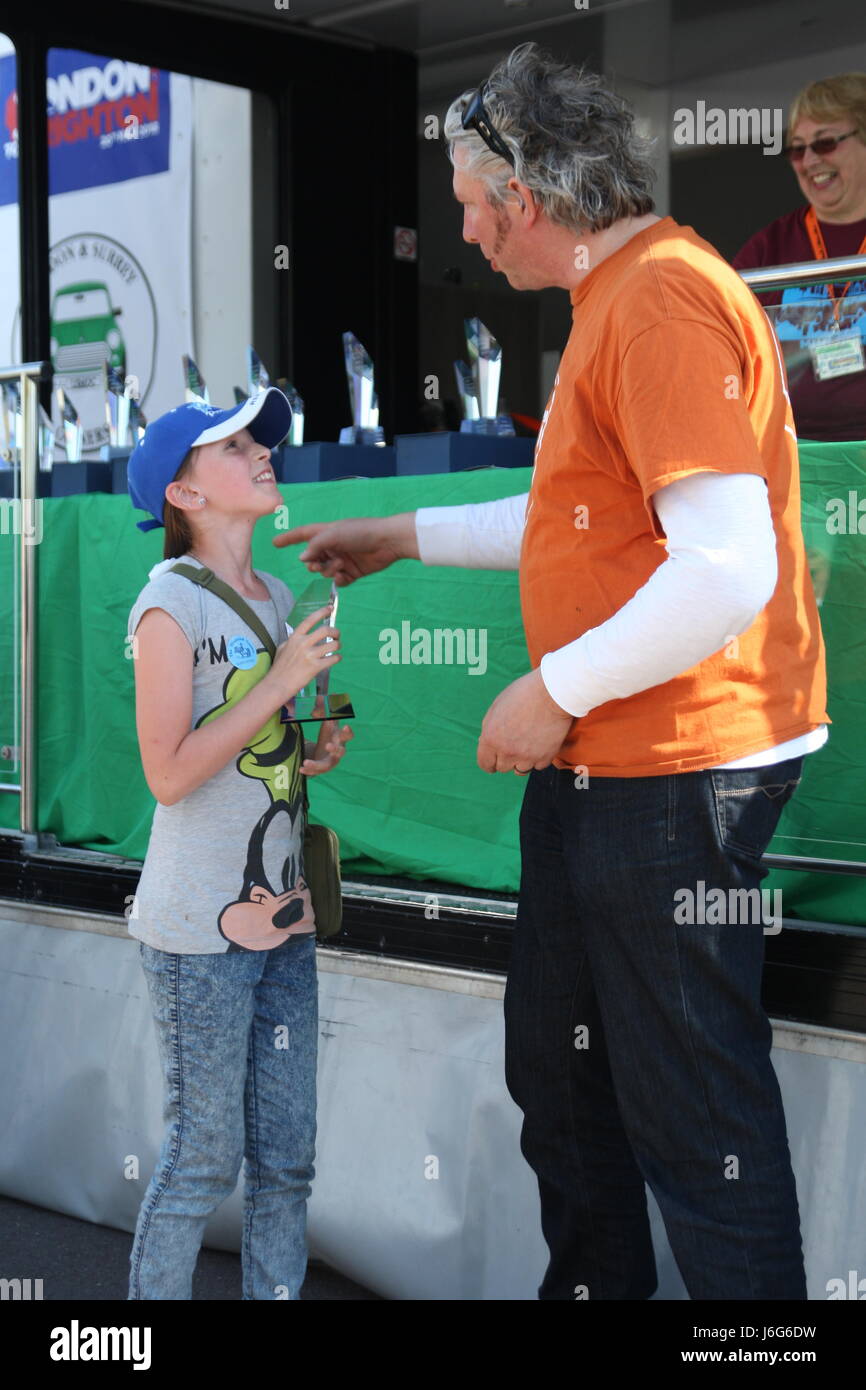 Brighton, UK. May 21st 2017. TV celebrity Edd China present an award to ...
